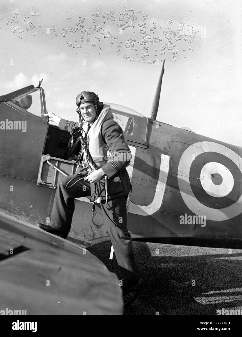 NEW ZEALAND FIGHTER PILOT WITH "NINE LIVES" A Squadron Leader, who ...