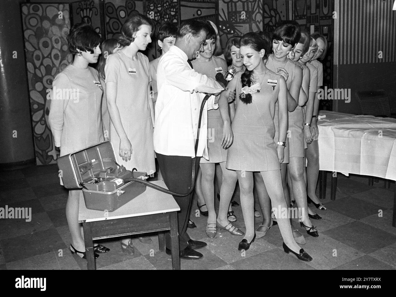Mini Skirted Girls Members Of The Staff Of A London Department Store Are Shown This Morning