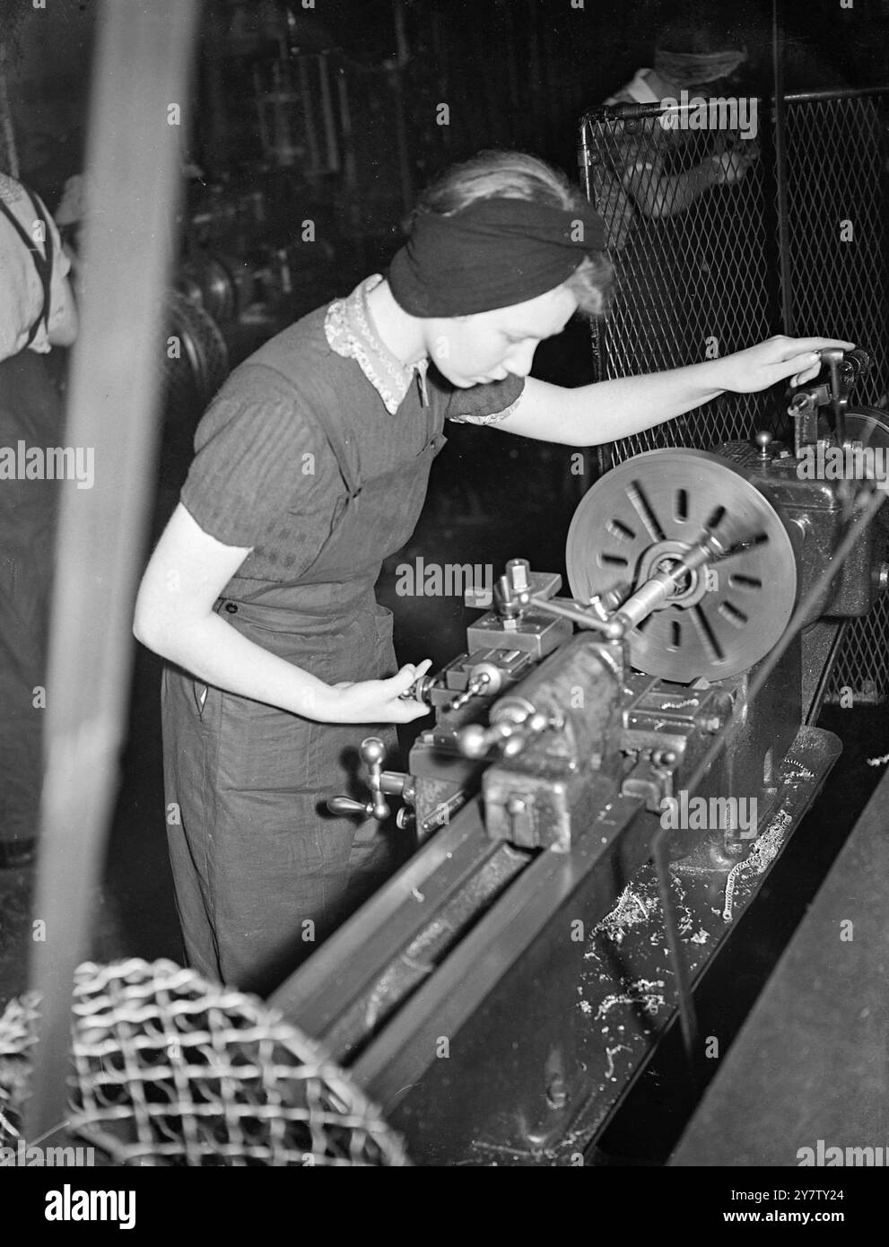 NOW SHE TRAINS TO MAKE "BOUQUETS" FOR HITLER Photo Shows: Miss Florence ...