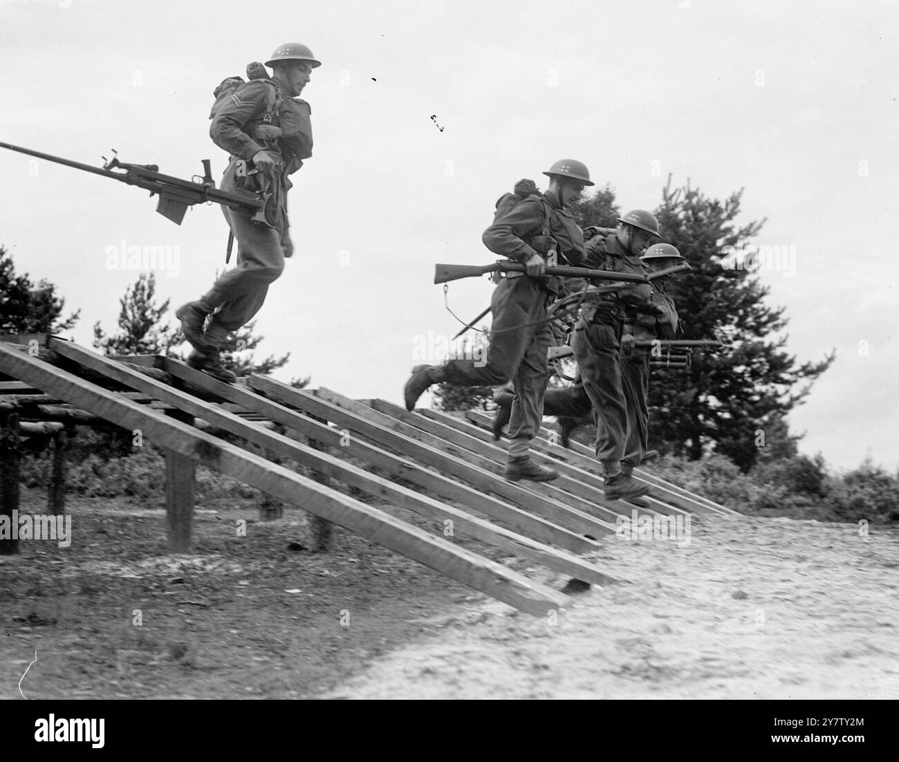 WITH THE GUARDS IN TRAINING This series of pictures, taken at a camp in ...