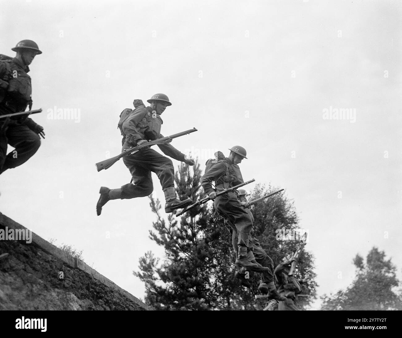 WITH THE GUARDS IN TRAINING This series of pictures, taken at a camp in ...