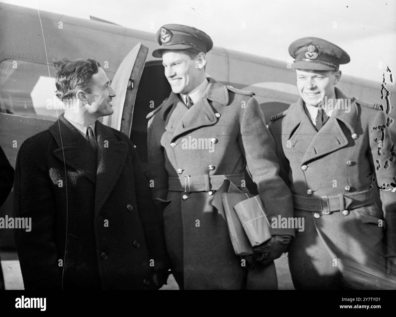 Photo Shows: The crew of a Lockheed immediately after arrival at an ...