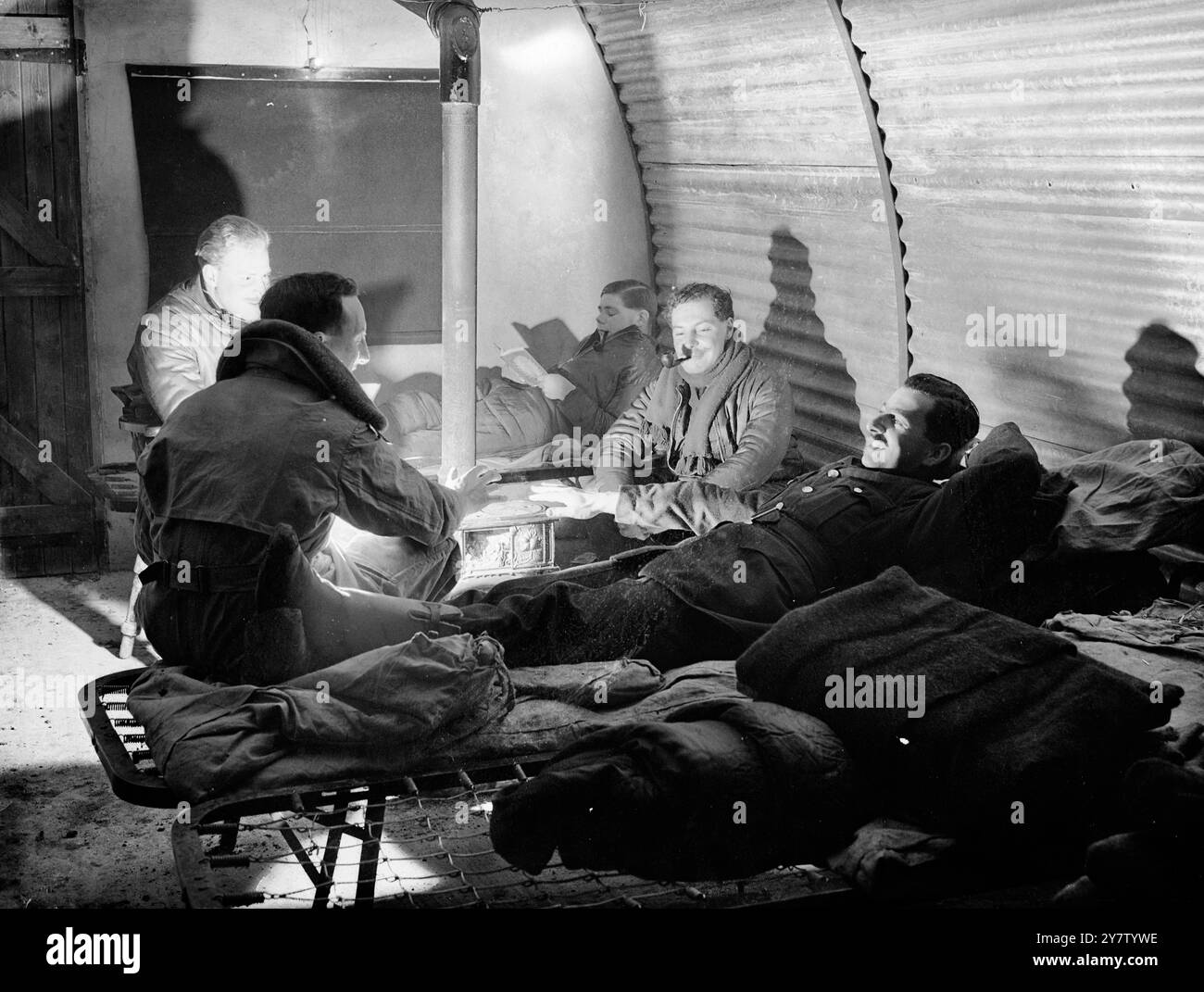 Photo Shows: Leading Aircraftsmen waiting in the rest hut of the RAF ...