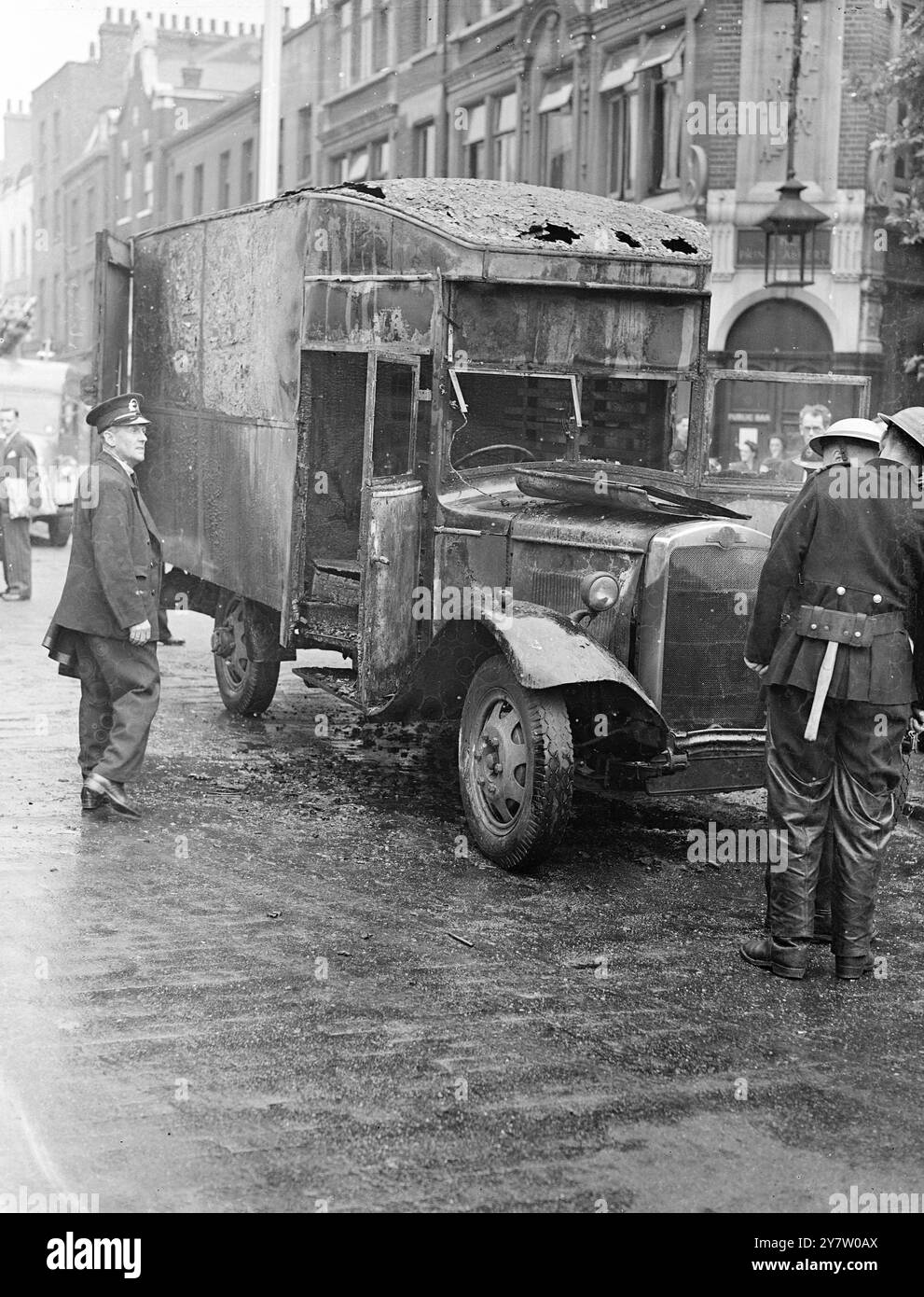 MAIL VAN BURNS IN STREET Firemen were called when a mail van driven by ...