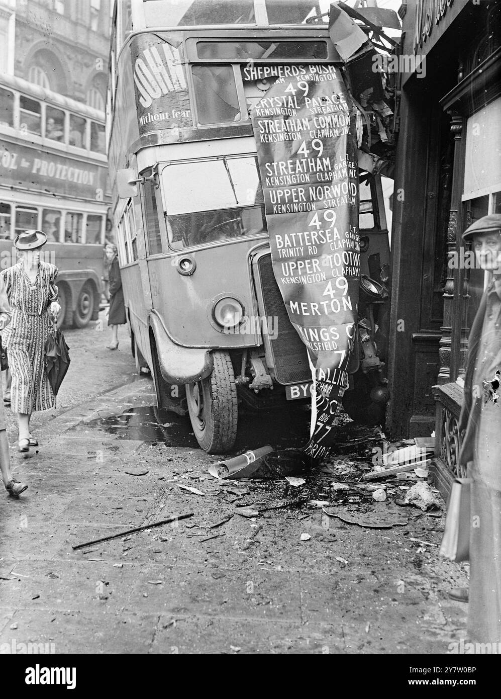 24 INJURED IN BUS SMASH WHEN TROPICAL STORM HITS LONDON Paving blocks ...