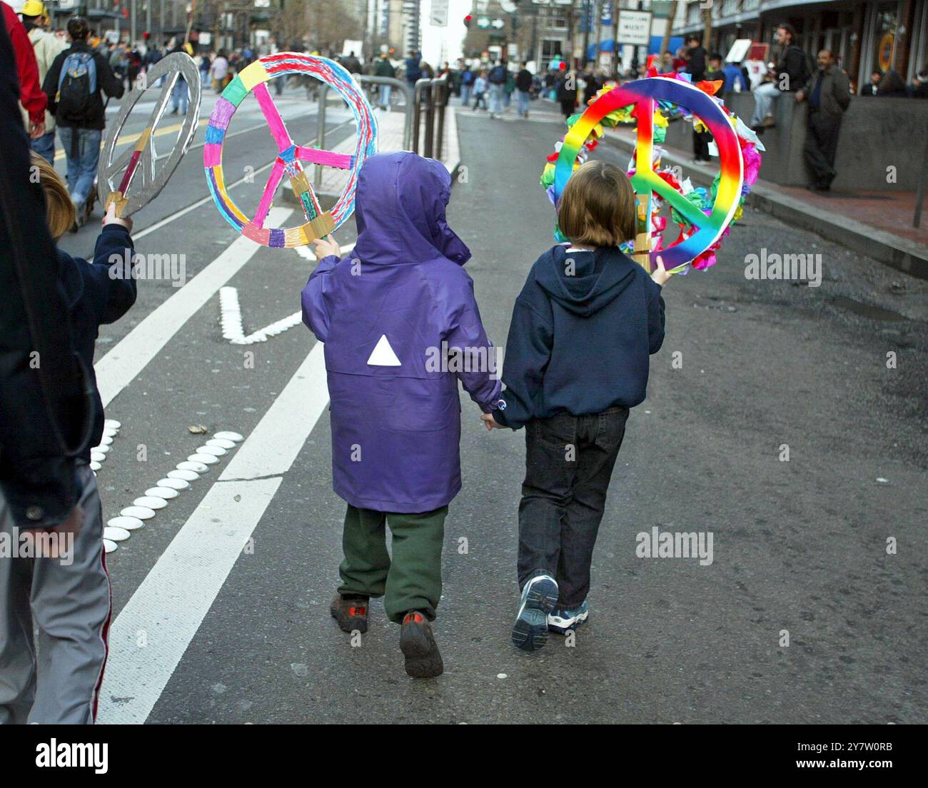 San Francisco, Calif.--Two young protesters hold hands while carrying ...