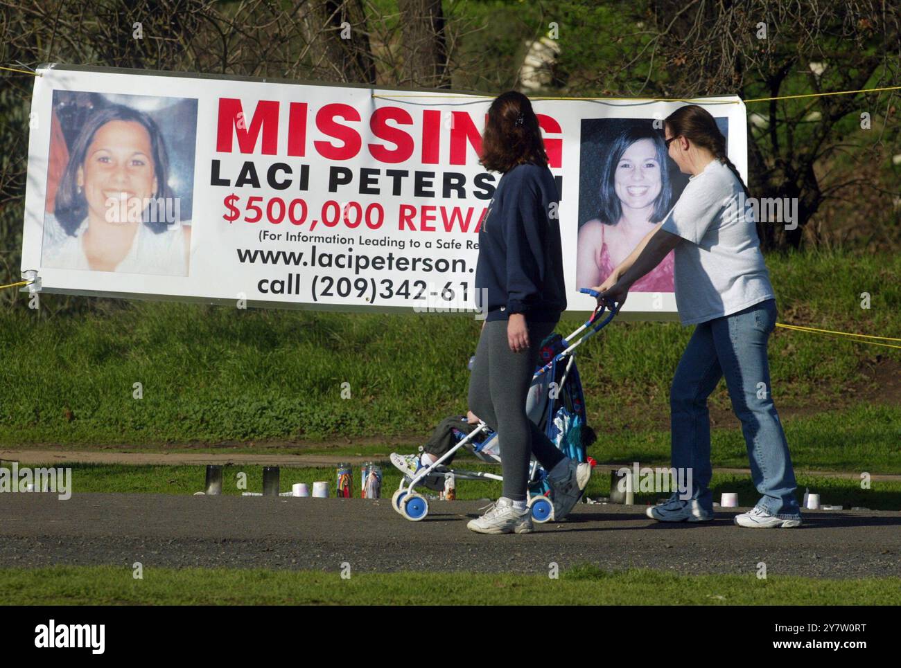Modesto, Calif.,---People walk past a sign and make shift memorial for ...