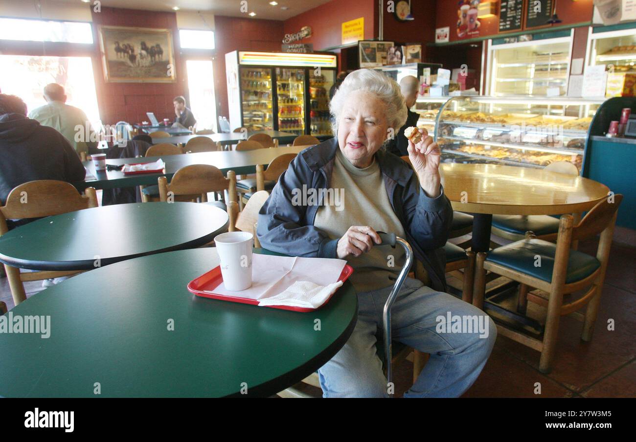 Palo Alto, CA 82 year old woman has her daily half-cup of coffee and a ...