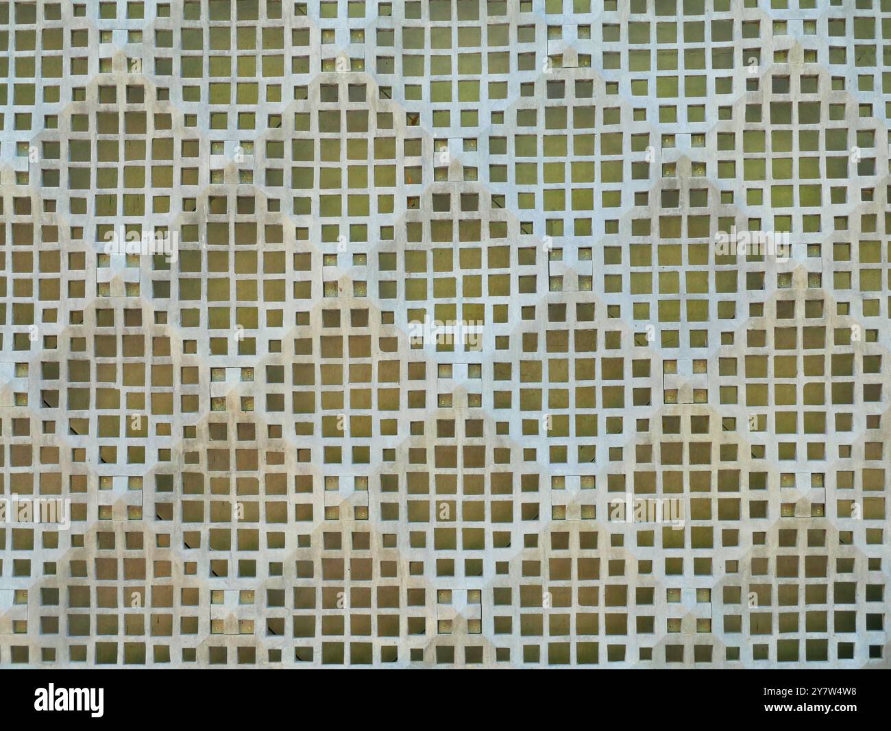 Entrance gate of a historical building, perforated metal with a rhombus ...