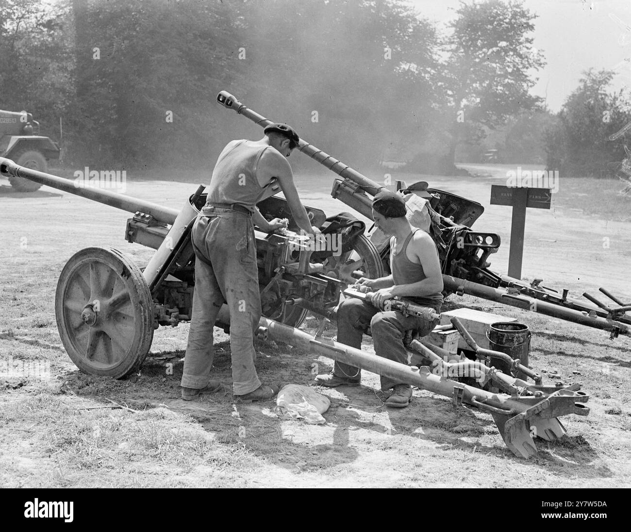 Photo Shows: French volunteers cleaning captured German 50mm guns at an ...
