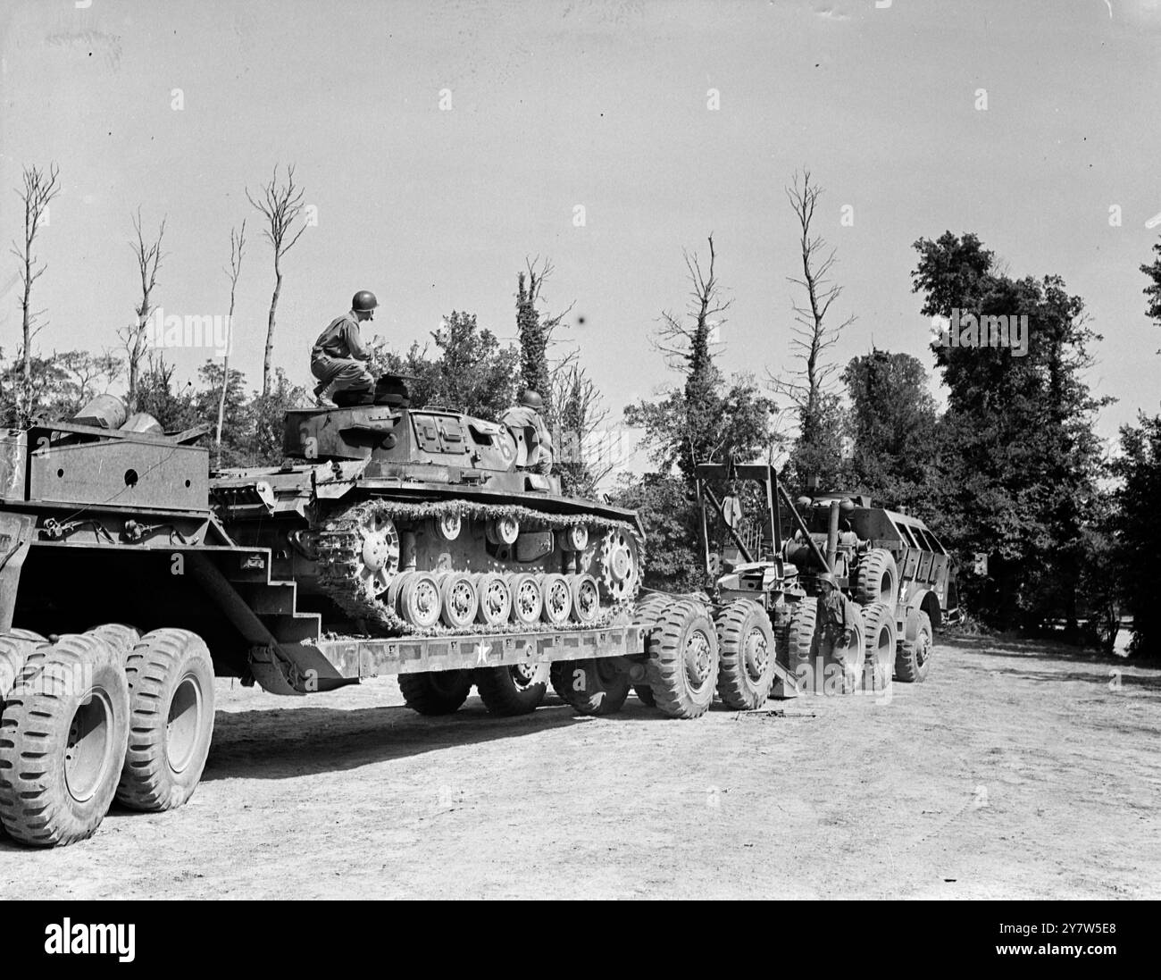 PHOTO SHOWS: Unloading a captured MK III German tank at an ordnance ...