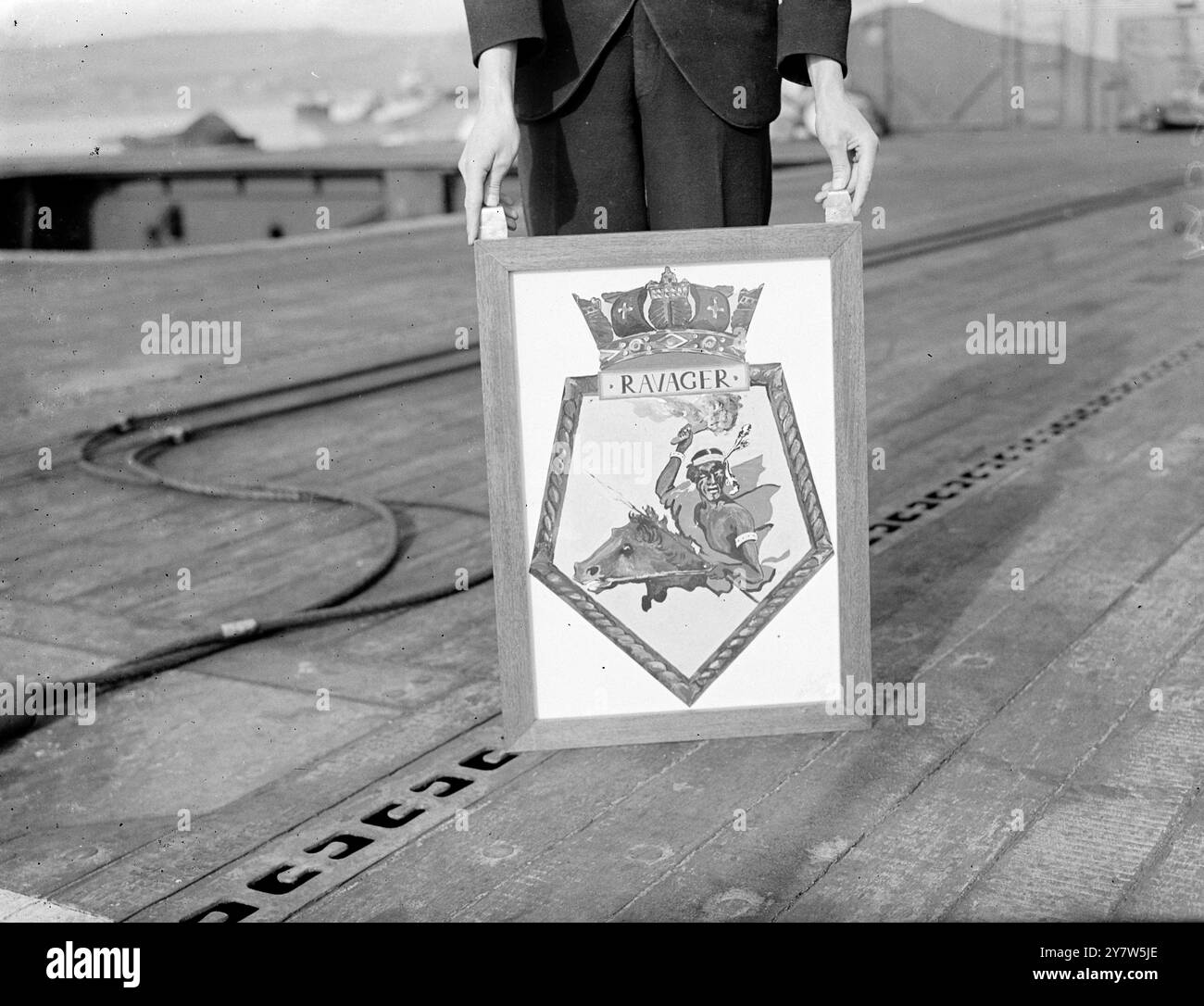 CREST OF THE ESCORT CARRIER HMS RAVAGER Photo Shows: The crest of the ...