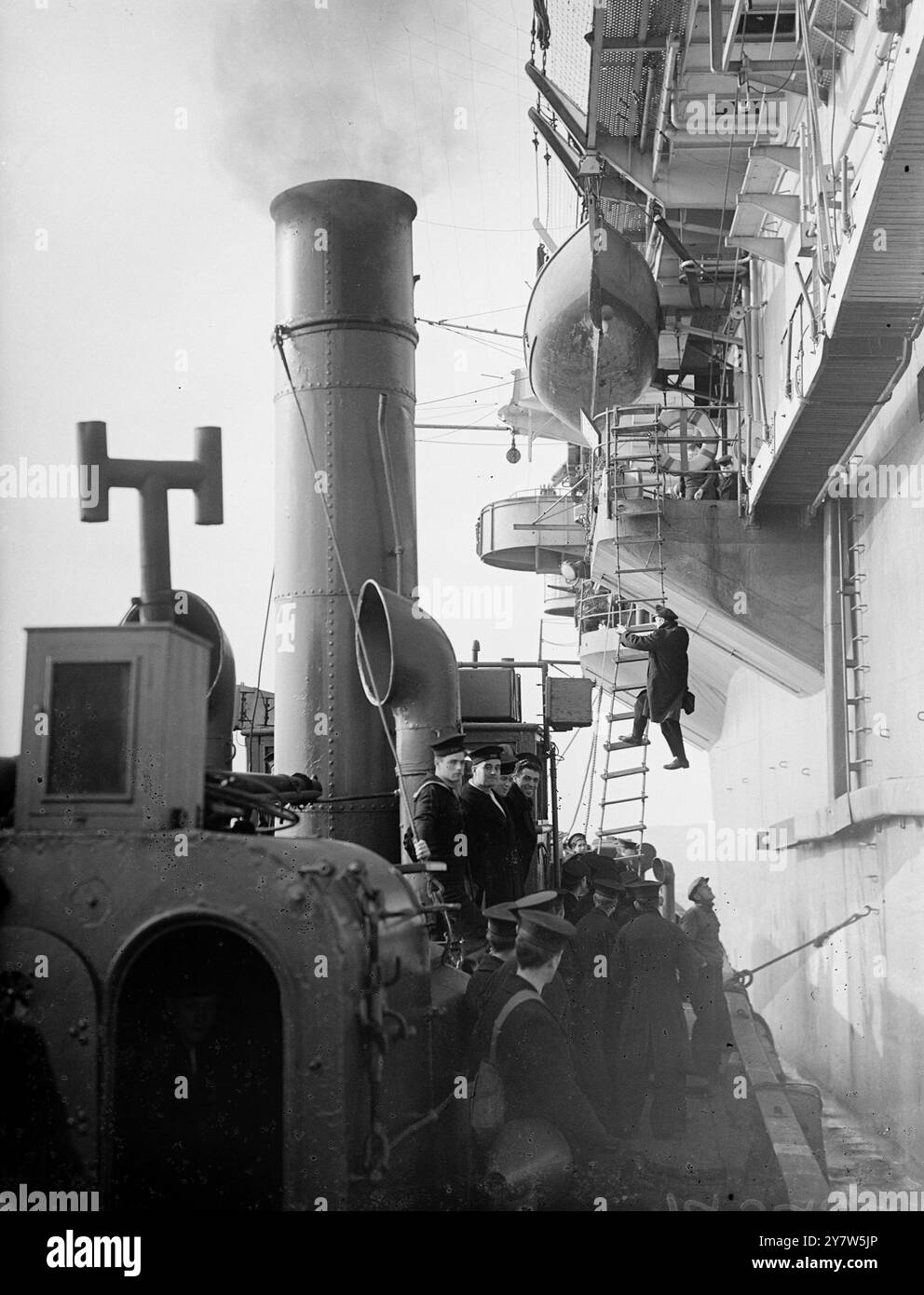 SHORE LEAVE FOR THE FLEET AIR ARM Photo shows: Men of the escort ...