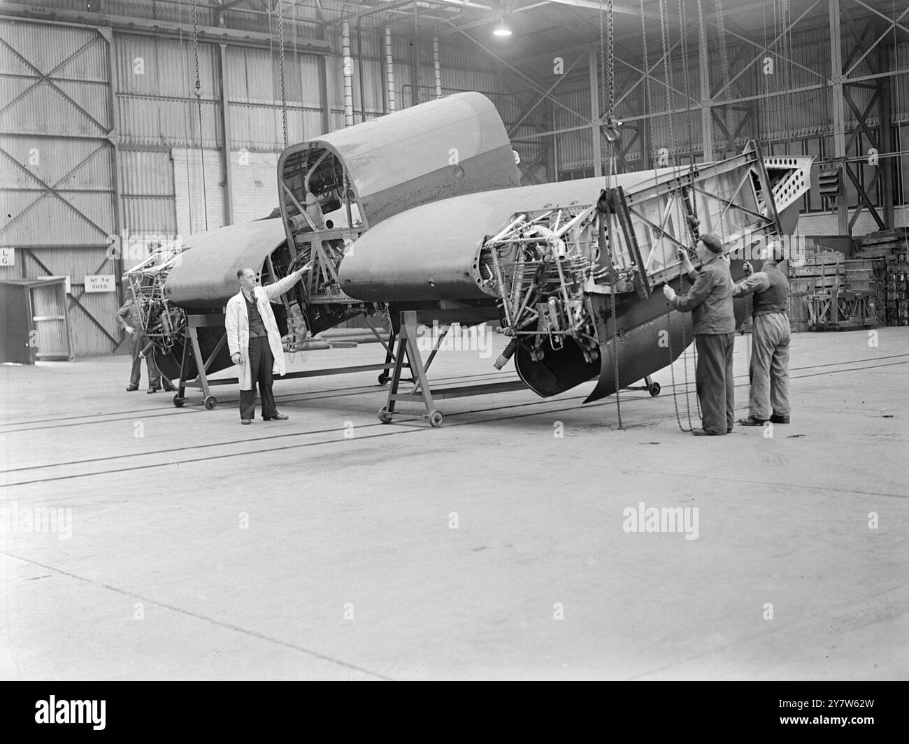 BUILDING THE BRITISH HALIFAX BOMBER Photo Shows: A centre wing section ...