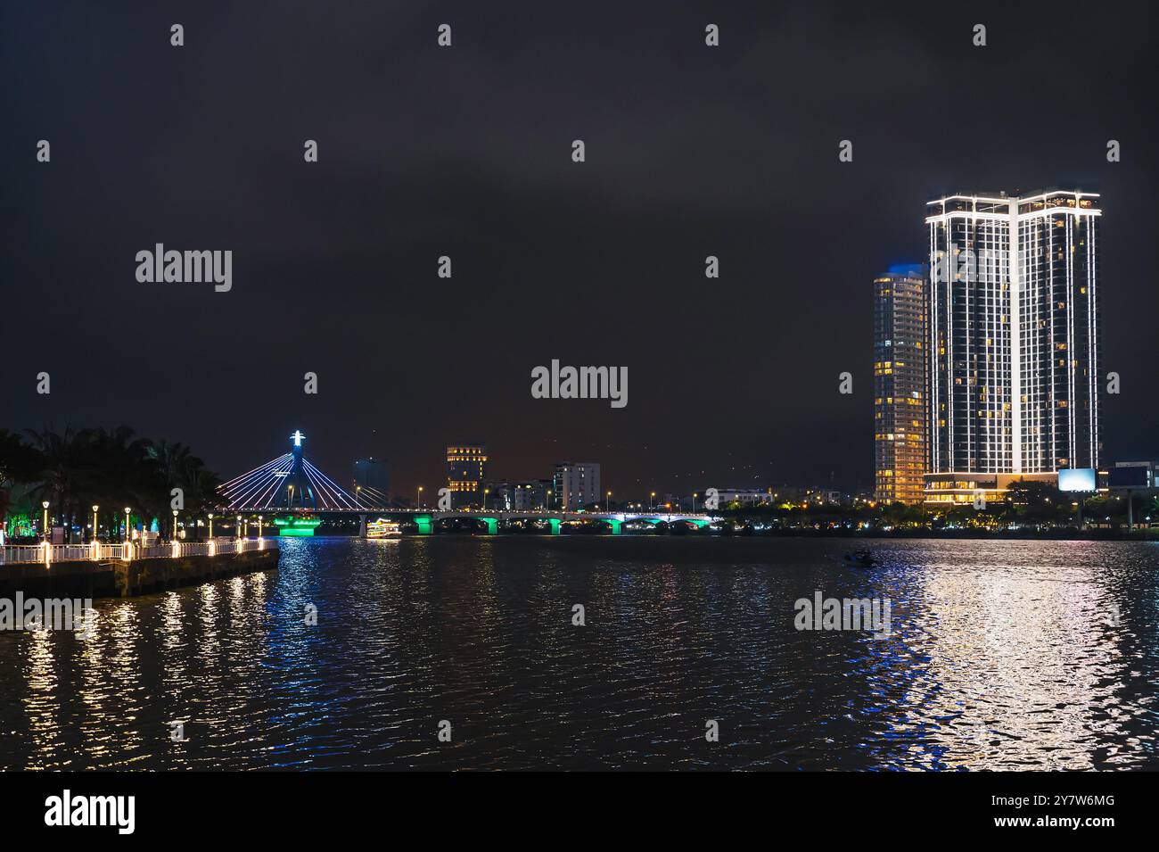 Night panorama of Da Nang city with a Han River Bridge over the Han ...