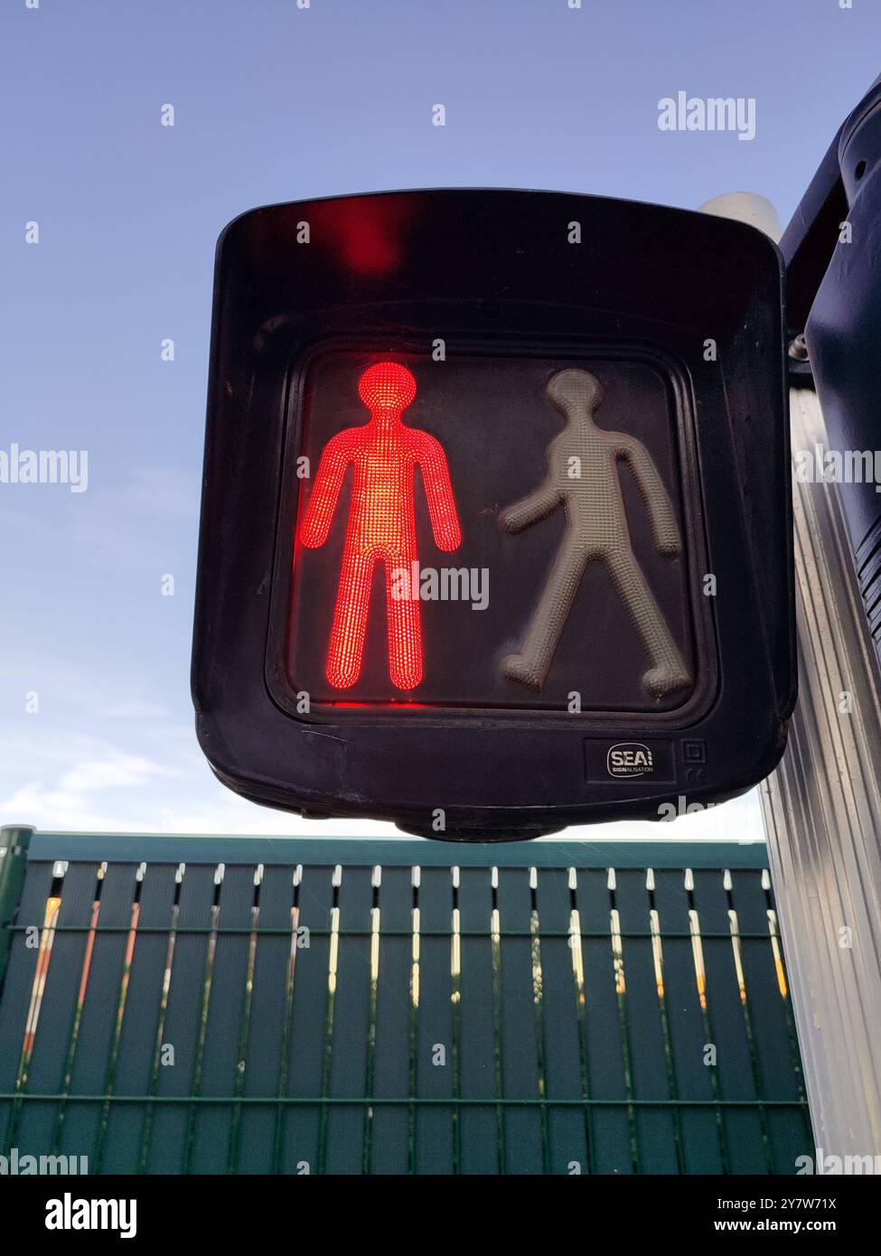 The pedestrian signal indicates safety by displaying both Walk and Dont ...