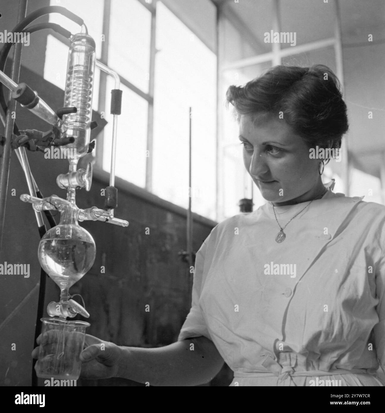 France - 1955A chemist carries out distillation in the analytical ...