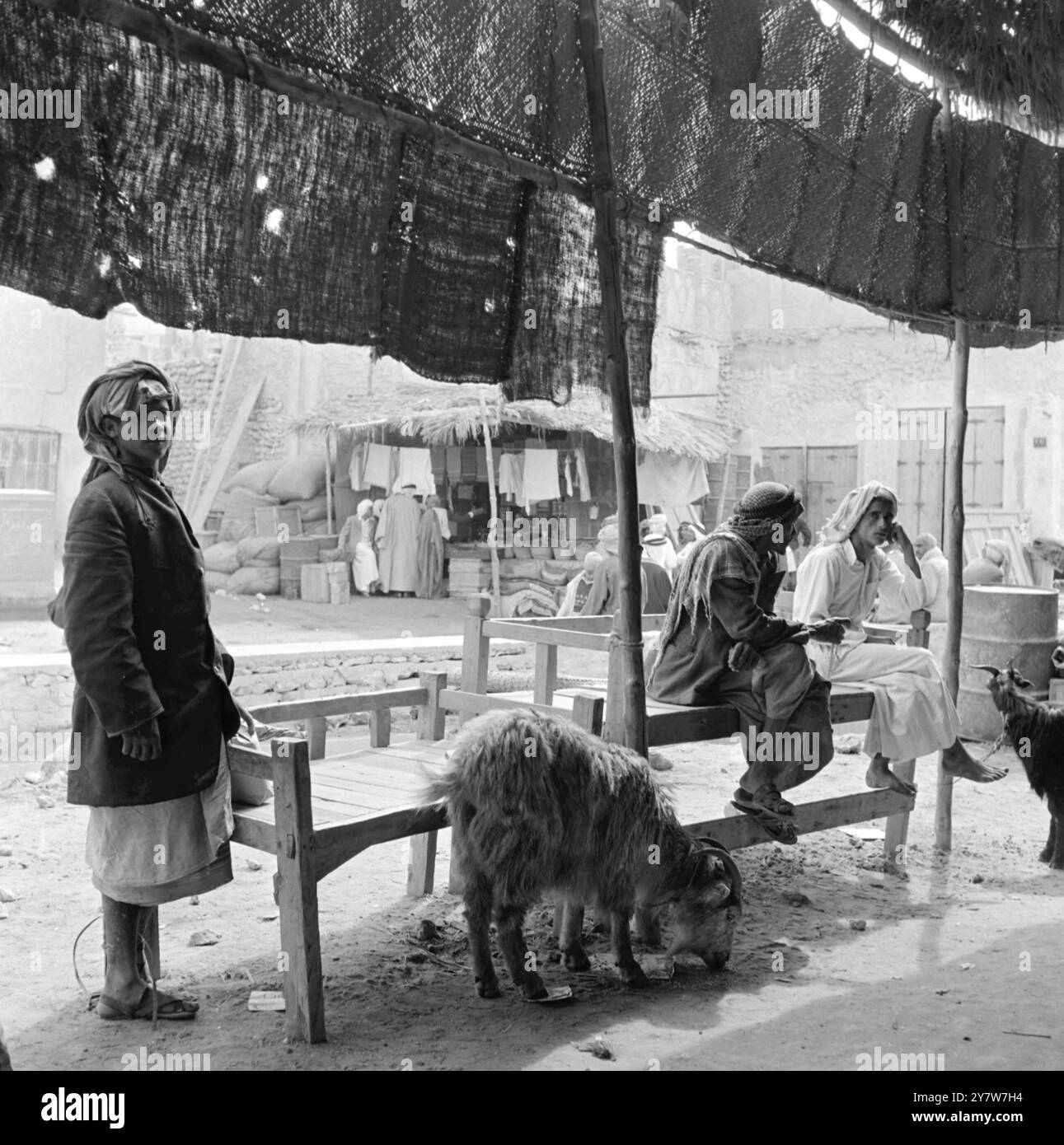Qatar - 1954 PICTURE SHOWS: Scene in the Suq or market-place of Doha ...
