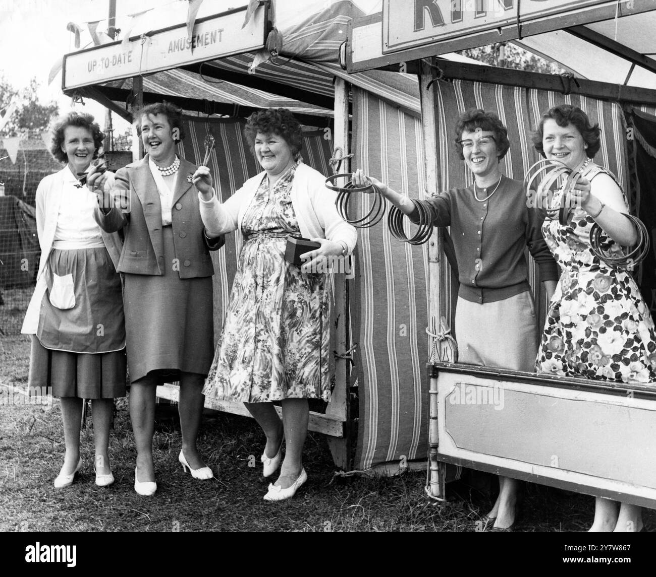 Women touting for business at the various sideshows at the Darenth Fete ...