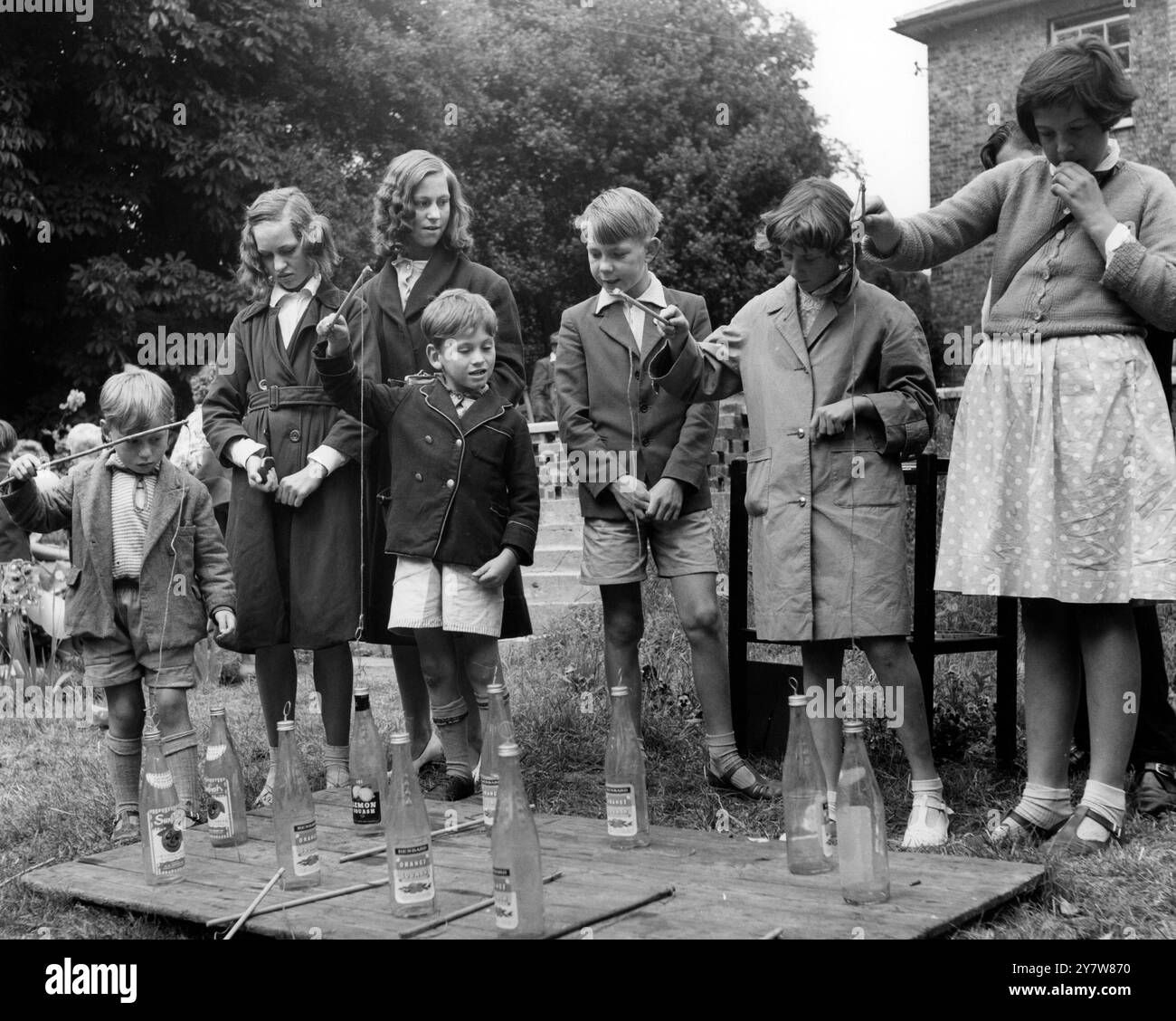 Darenth Village Fete : Children enjoying a game of 'fishing' at the ...