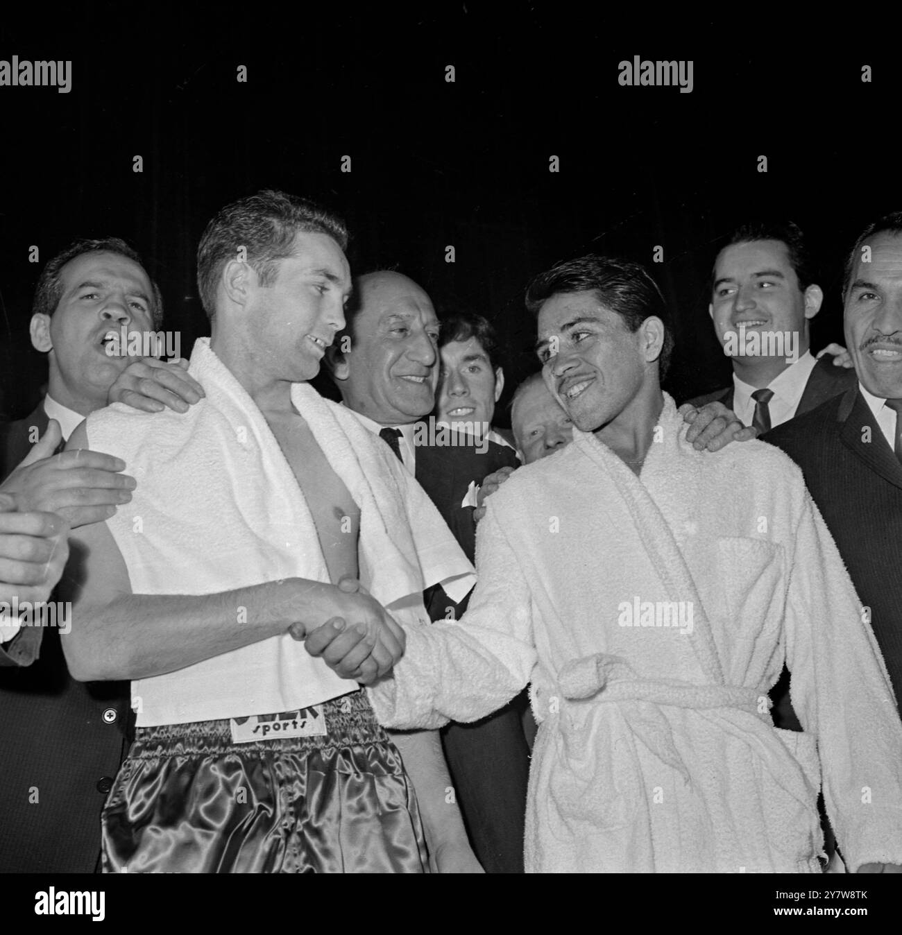 World featherweight champion (right) Vicente Saldivar of Mexico shakes ...