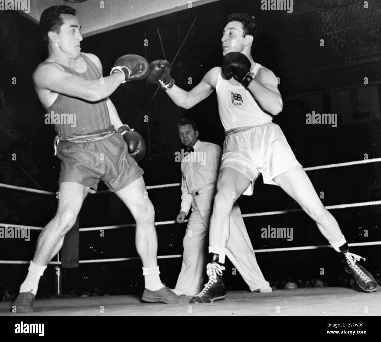 Nicky Gargano of England ( right) leads with a right during his semi ...