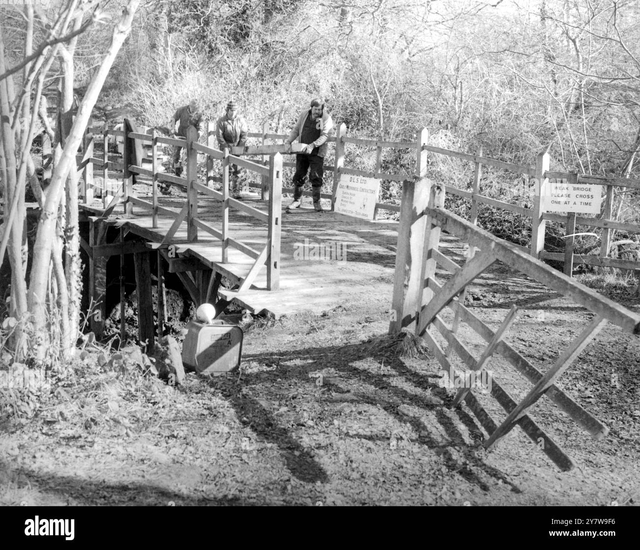 Pooh's bridge has been repaired. The bridge is to be seen over a brook ...