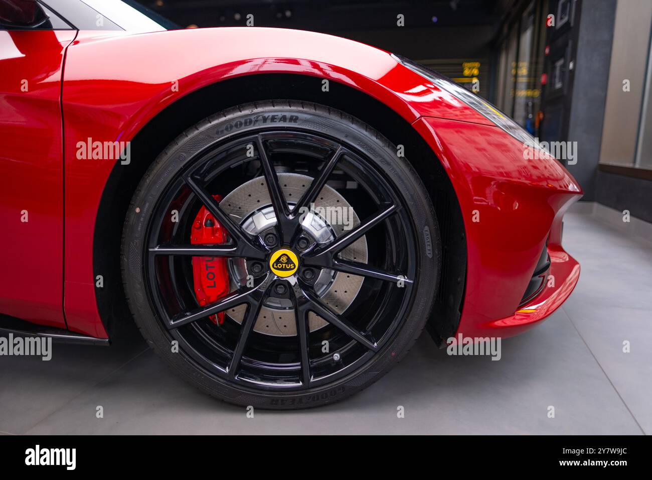 wheel red Lotus Emira in showroom, British exciting sports car Lotus ...