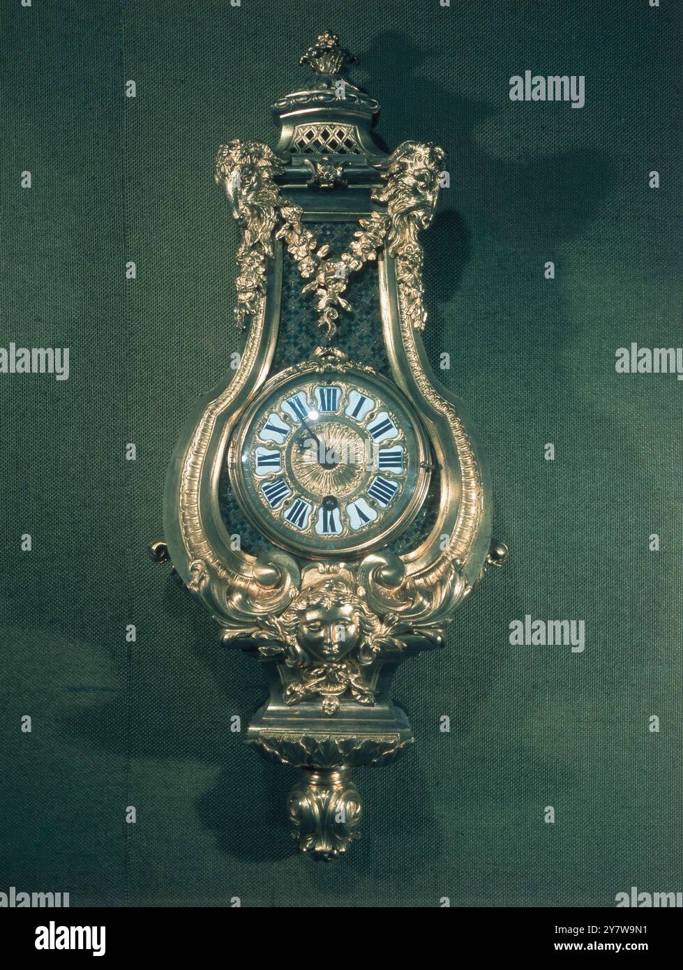 73486.tif Cartel clock, mounted in ormolu with blue enamel numerals on ...