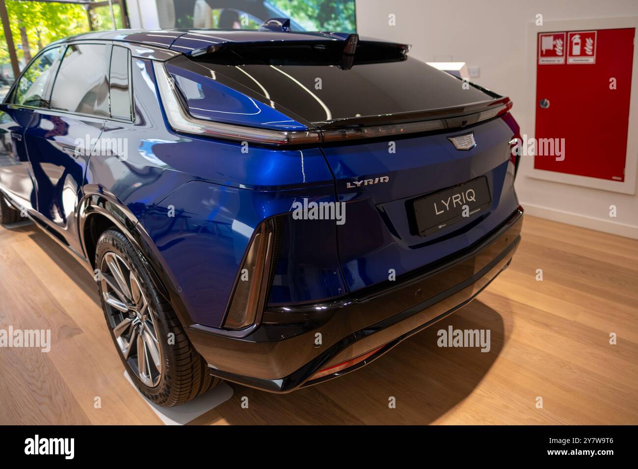 blue Cadillac Lyriq, premium electric SUV General Motors in showroom ...