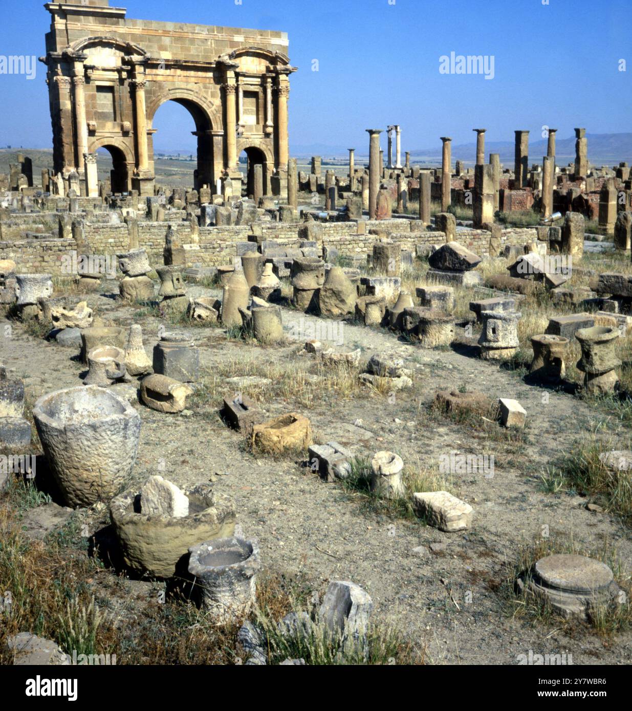 Timgad ruins and Triumphal Arch, Algeria - At the west end of the ...