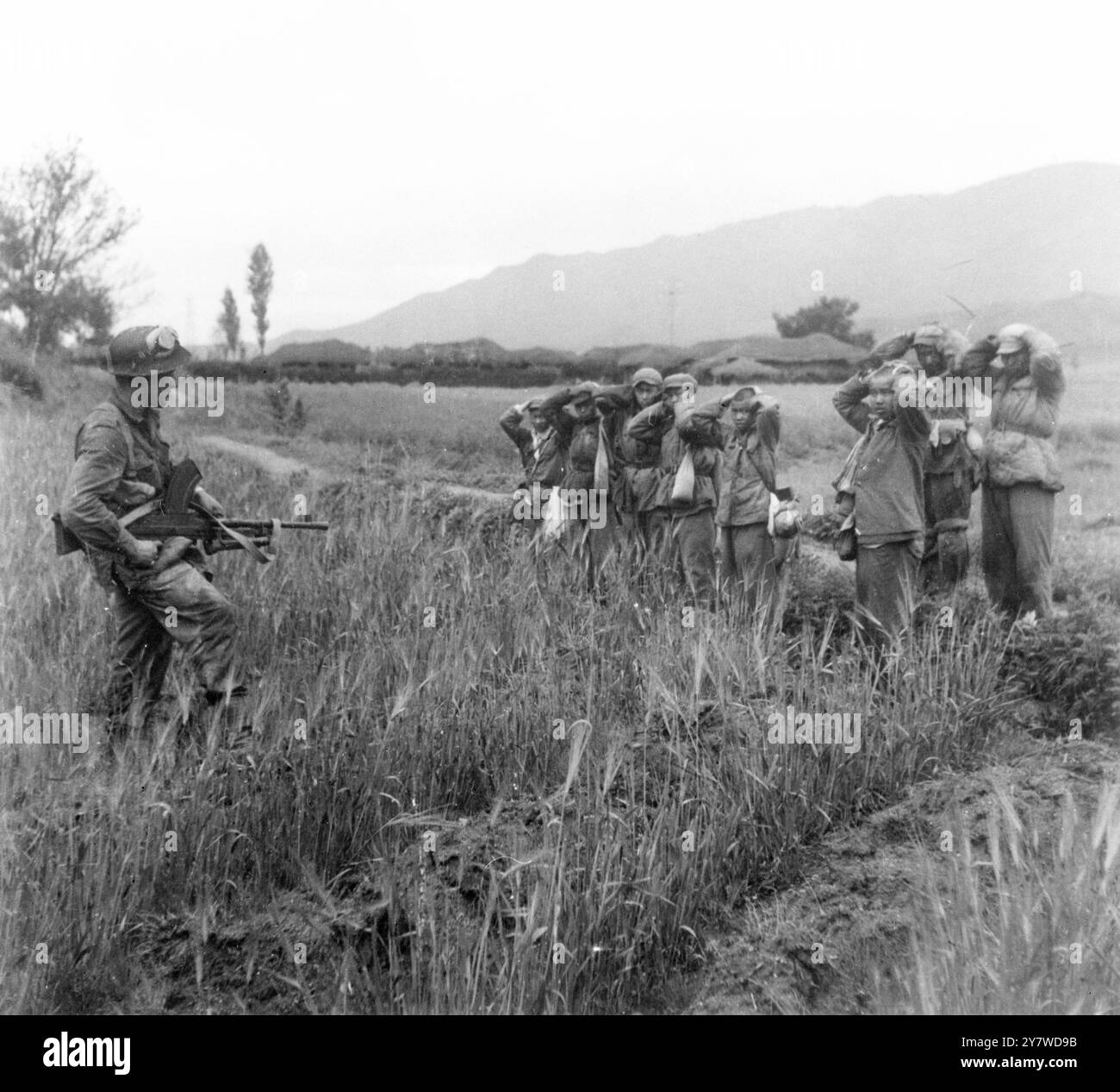 Korean Internment A Canadian soldier , member of a 2RCR patrol passes a ...