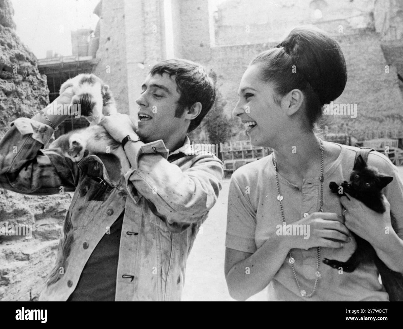 Ian McShane and his wife playing Ruth with a kitten during a break in ...
