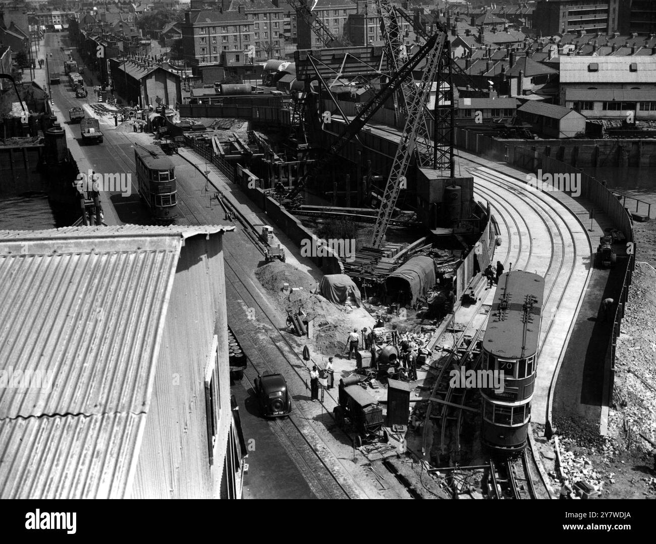 A tram moving through Deptford at Creek Road across a Temporary Draw ...