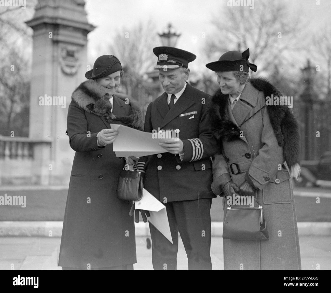 Investiture at Buckingham Palace . Captain GF Cargill , MBE with Mrs ...
