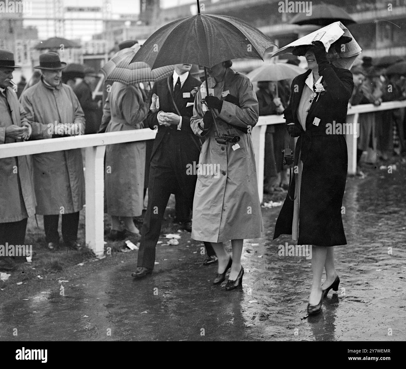 At the Royal Ascot race meeting - wet weather scenes on Ascot ' s last ...