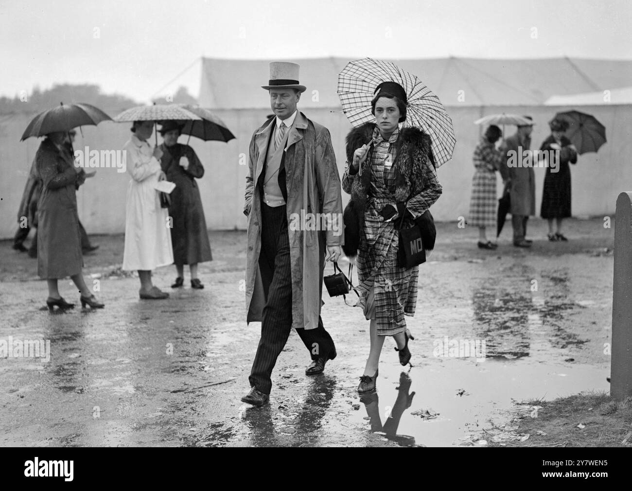 At the Royal Ascot race meeting - wet weather scenes on Ascot ' s last ...