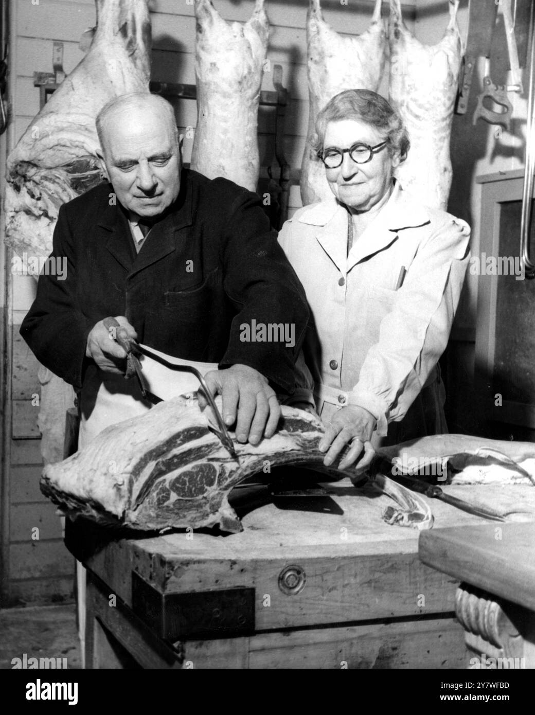 Butchers shop in the 1950s - rib of beef 3rd February 1956 Stock Photo ...
