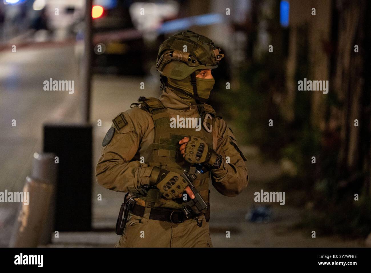 Tel Aviv, Israel. 01st Oct, 2024. An IDF officer stands at the site of ...