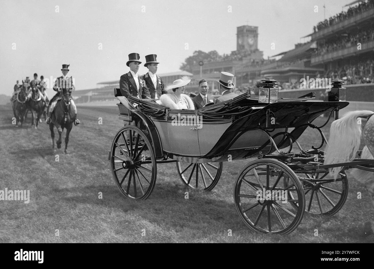 The start of the Royal Ascot Race meeting . The King and Queen passing ...
