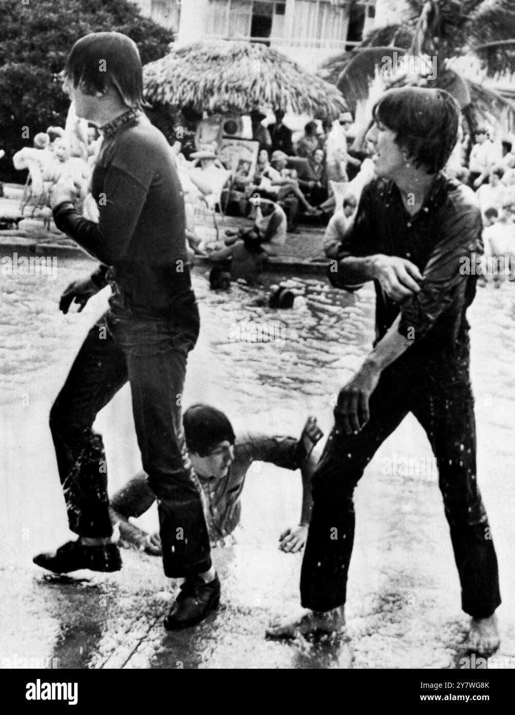 The Beatles - John Lennon , Paul McCartney and George Harrison ermerge ...