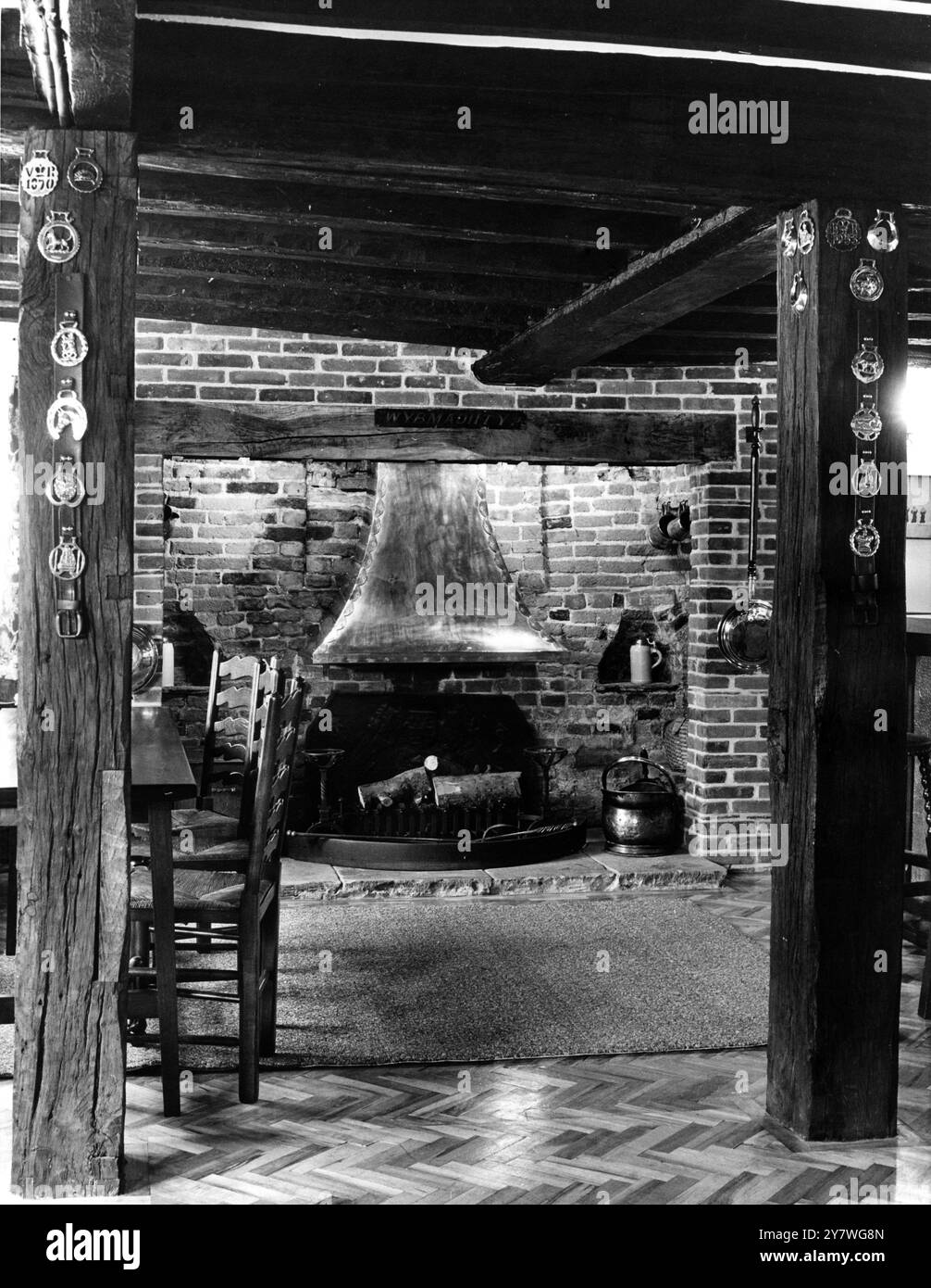 The interior and fireplace in the White Hart Hotel , Brasted , Kent ...