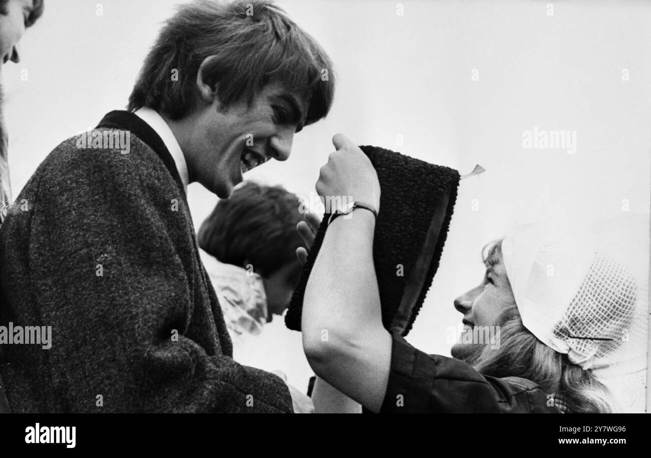 The Beatles George Harrison gets set to don a traditional Dutch ...