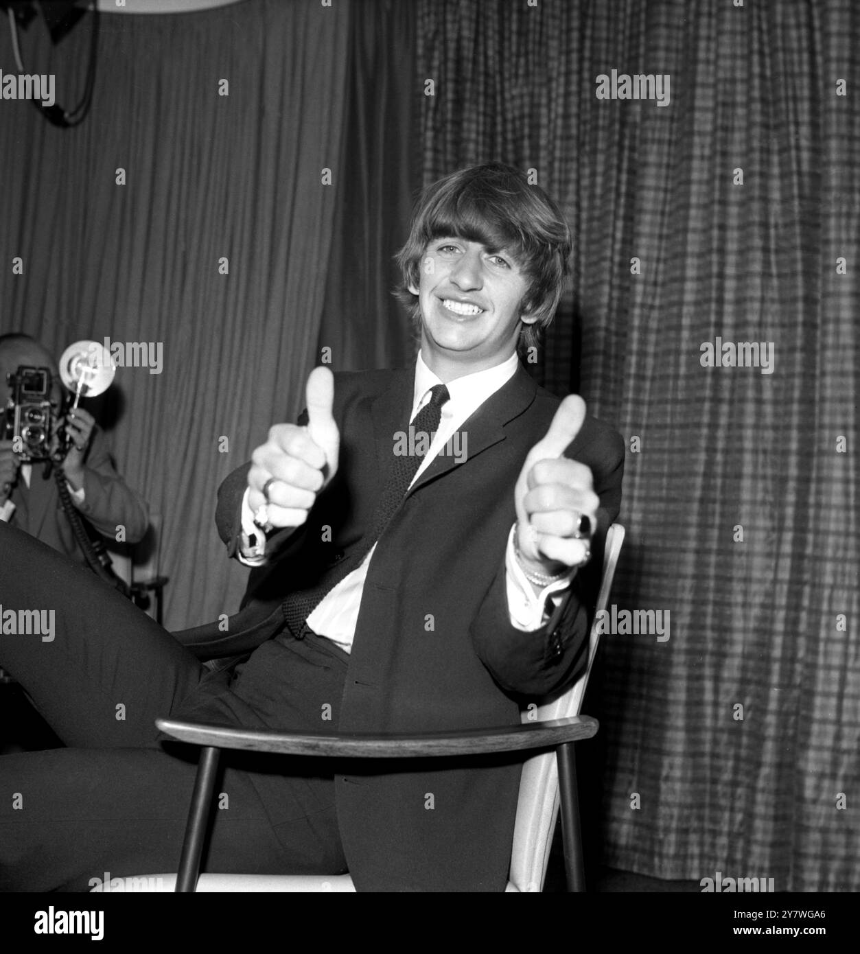 Ringo Starr giving the thumbs up before leaving London airport to ...