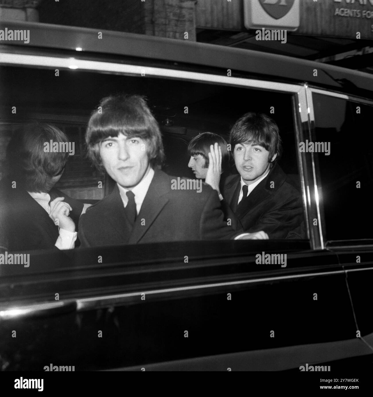 The Beatles on their way to Buckingham Palace to collect their MBE ' s ...