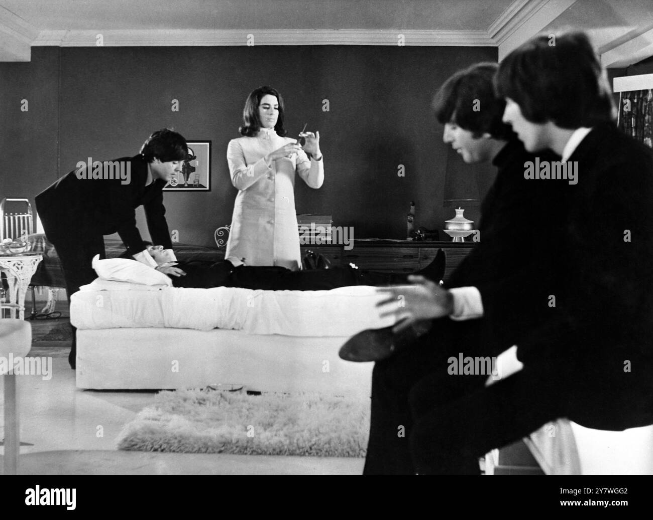 The Beatles in a scene from their film " Help! " , with Eleanor Bron . Paul McCartney ( left ...