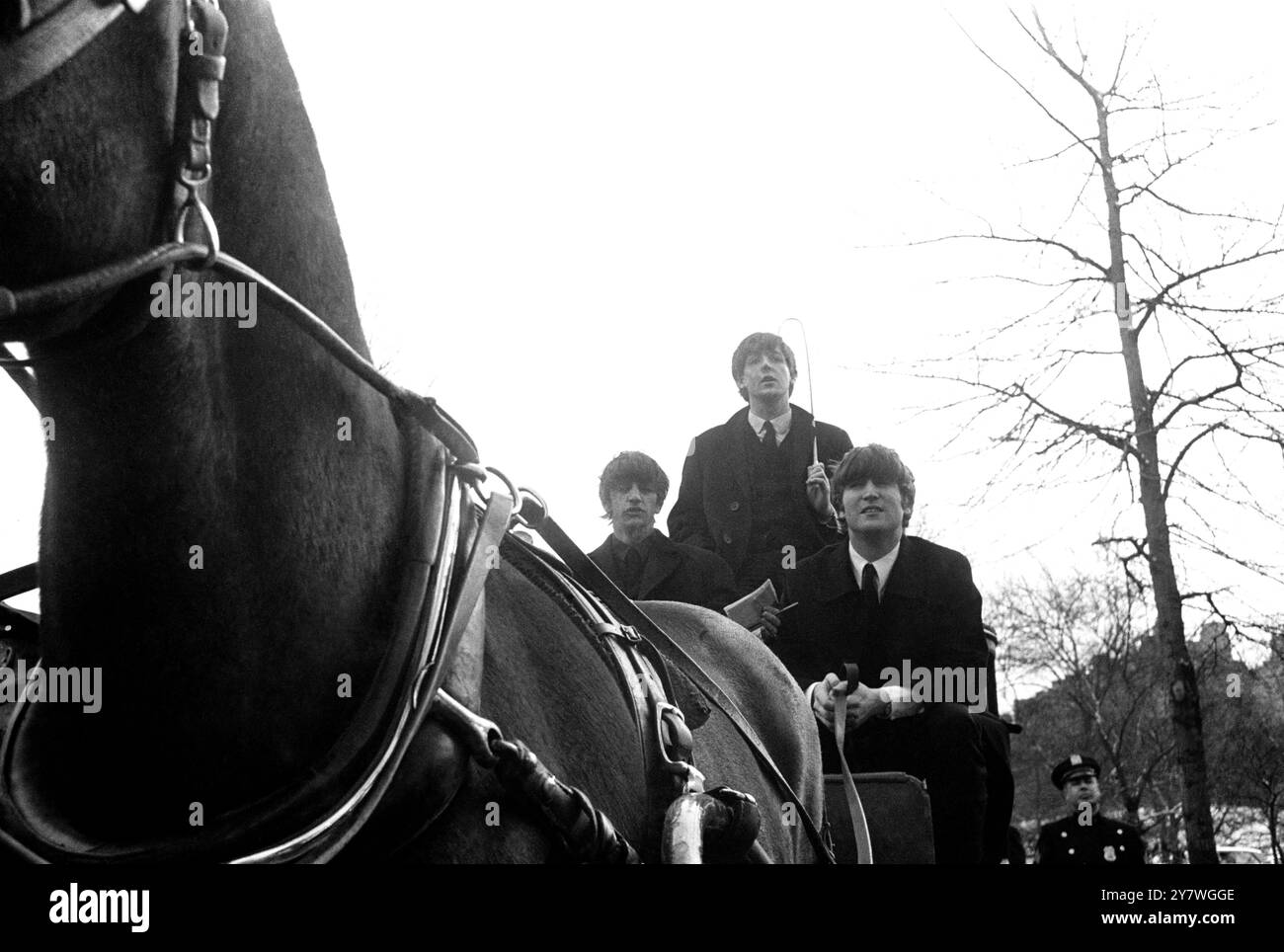 The Beatles take a ride in a horse - drawn carriage in New York ' s ...
