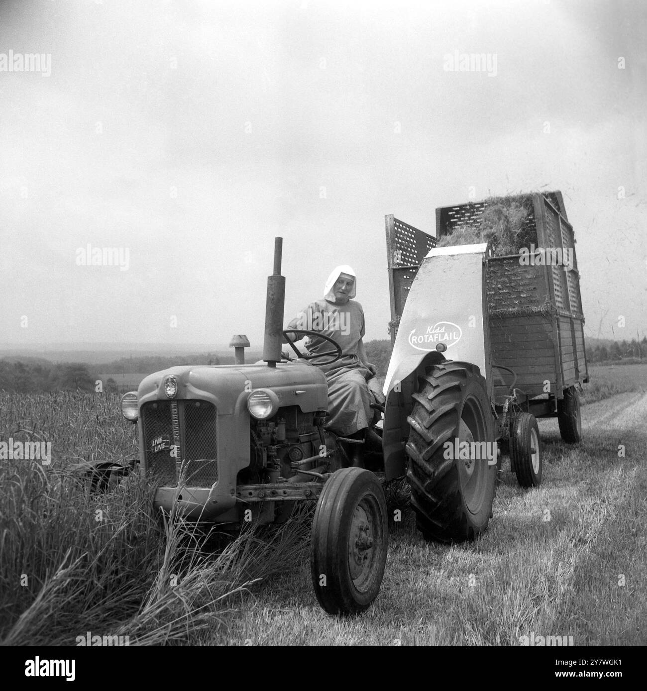 Farm tractor driver is a Sister of the Franciscan Mission of Divine ...