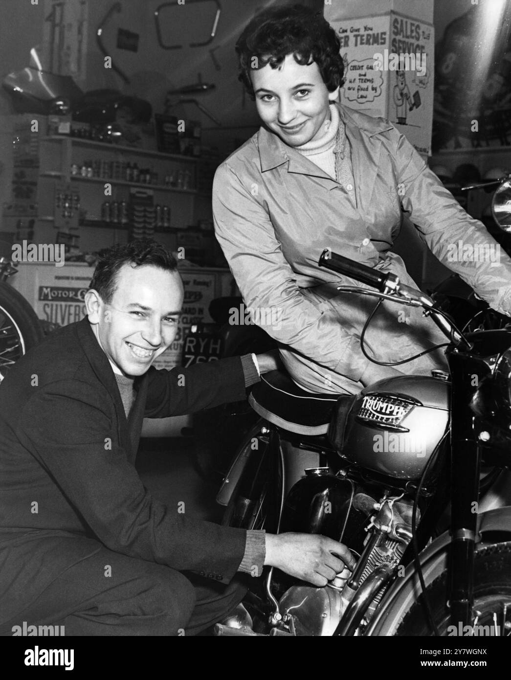 John and Dorothy Surtees in their family motorcycle shop 1950s Stock ...