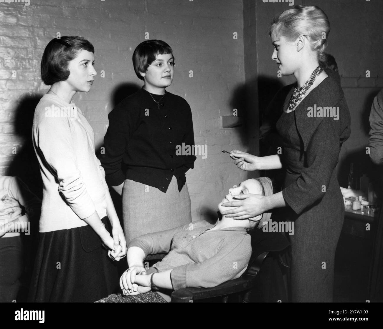 Susan Bell , a model from the Lorna Doone Model School , demonstrating ...